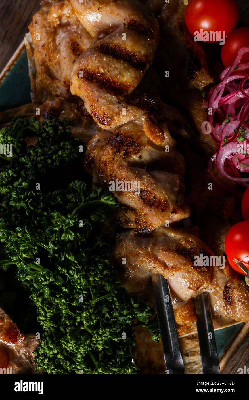 Grilled chicken and pork barbeque Stock Photo - Alamy