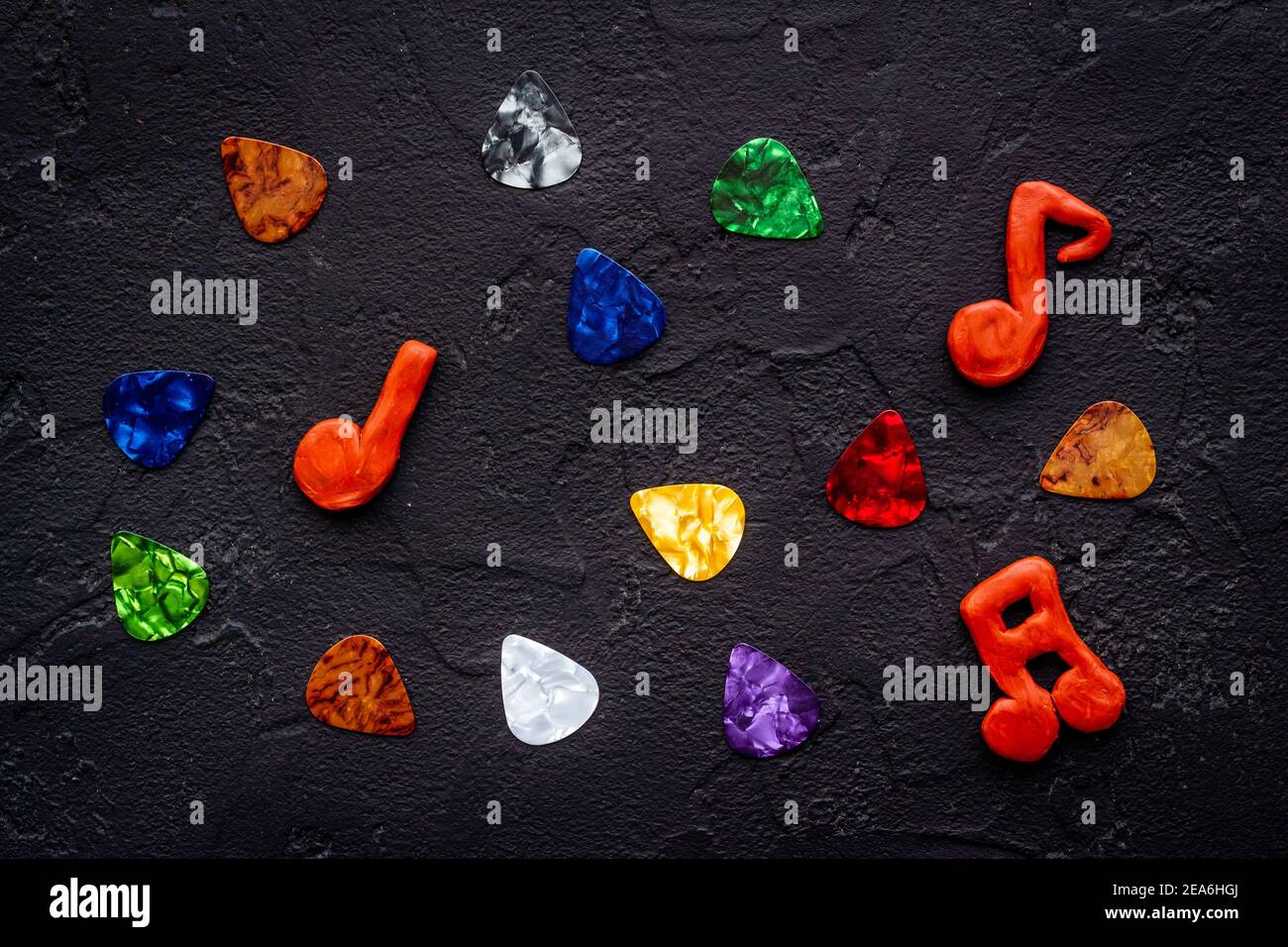 Guitar picks pattern. top view. Music background Stock Photo - Alamy