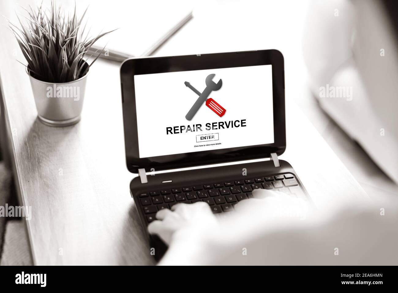 Laptop screen displaying a repair service concept Stock Photo - Alamy