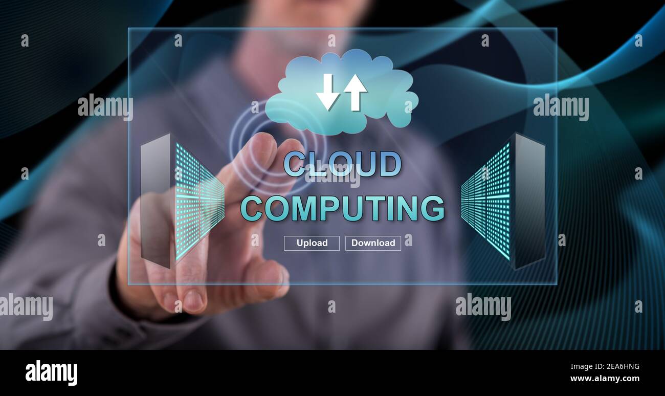 Man touching a cloud computing concept on a touch screen with his ...