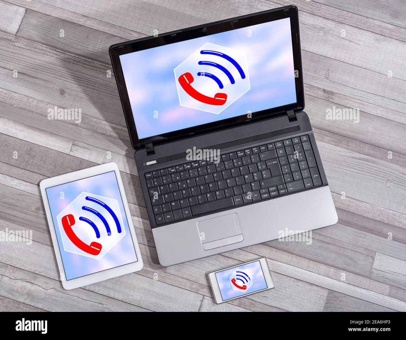 Hotline concept shown on different information technology devices Stock ...