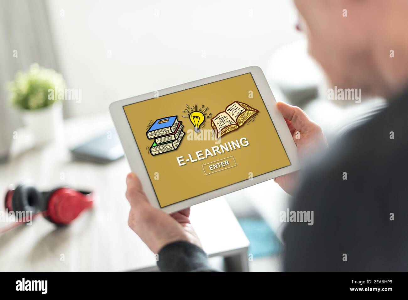 Tablet screen displaying an e-learning concept Stock Photo - Alamy