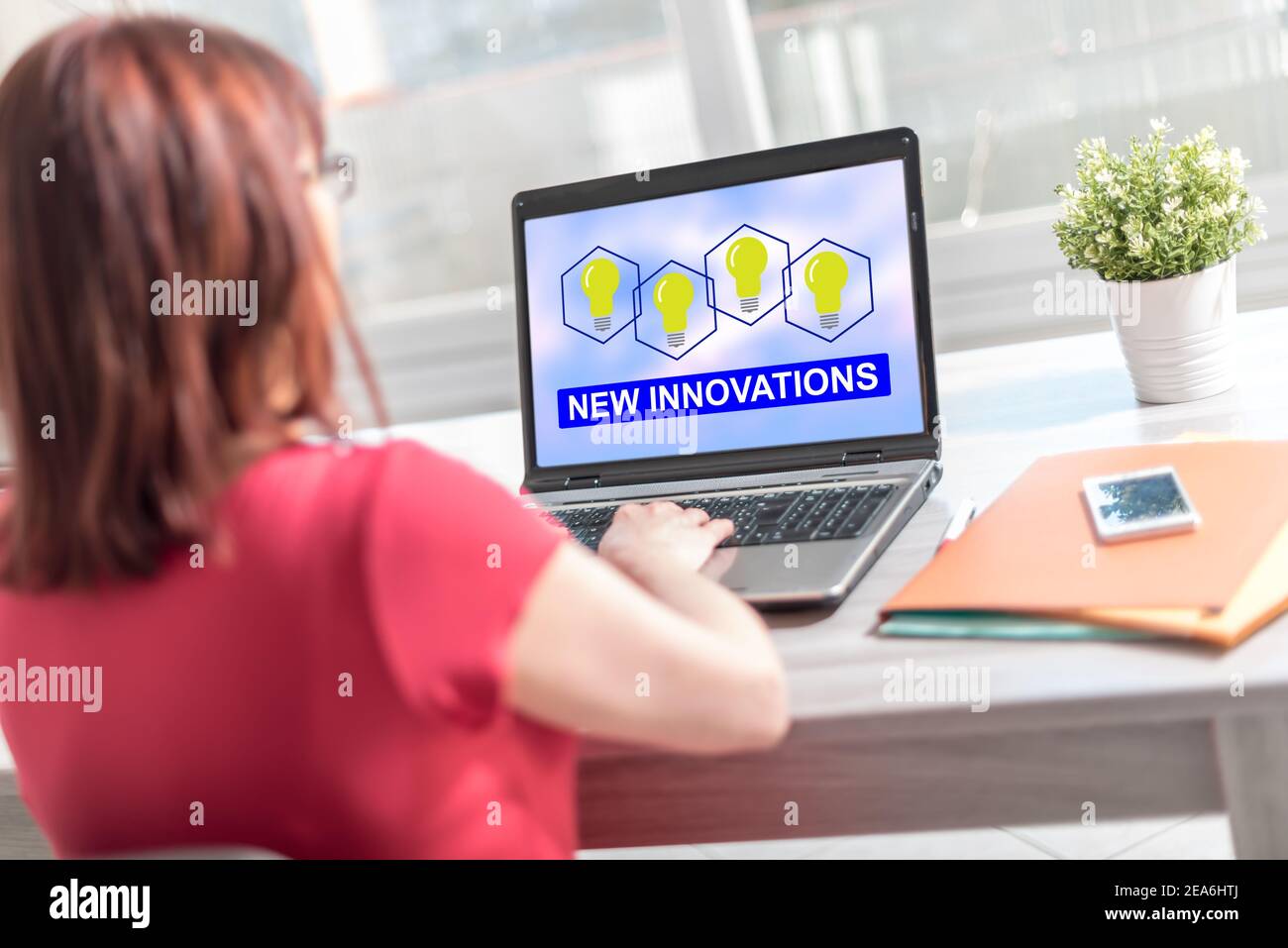 Laptop screen displaying a new innovations concept Stock Photo - Alamy