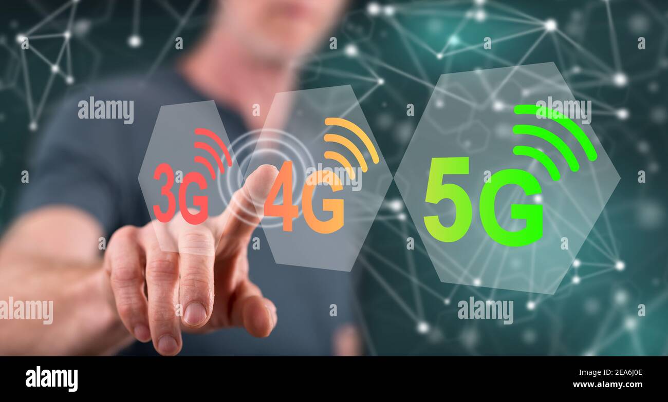 Man touching a 5g concept on a touch screen with his finger Stock Photo ...