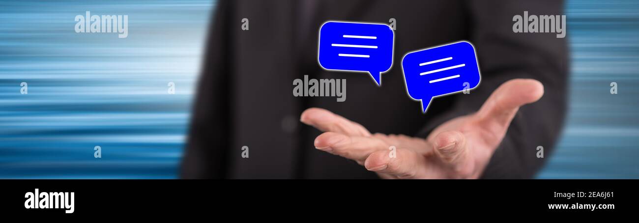 Dialogue concept above the hand of a man in background Stock Photo - Alamy