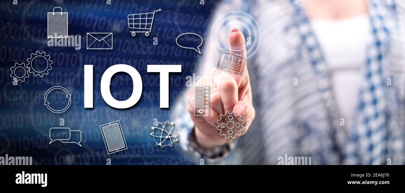 Woman touching an iot concept on a touch screen with her finger Stock ...