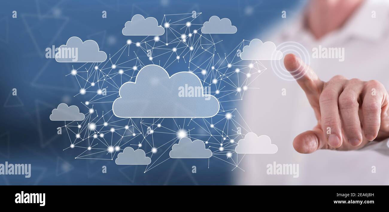 Man touching a cloud networking concept on a touch screen with his ...