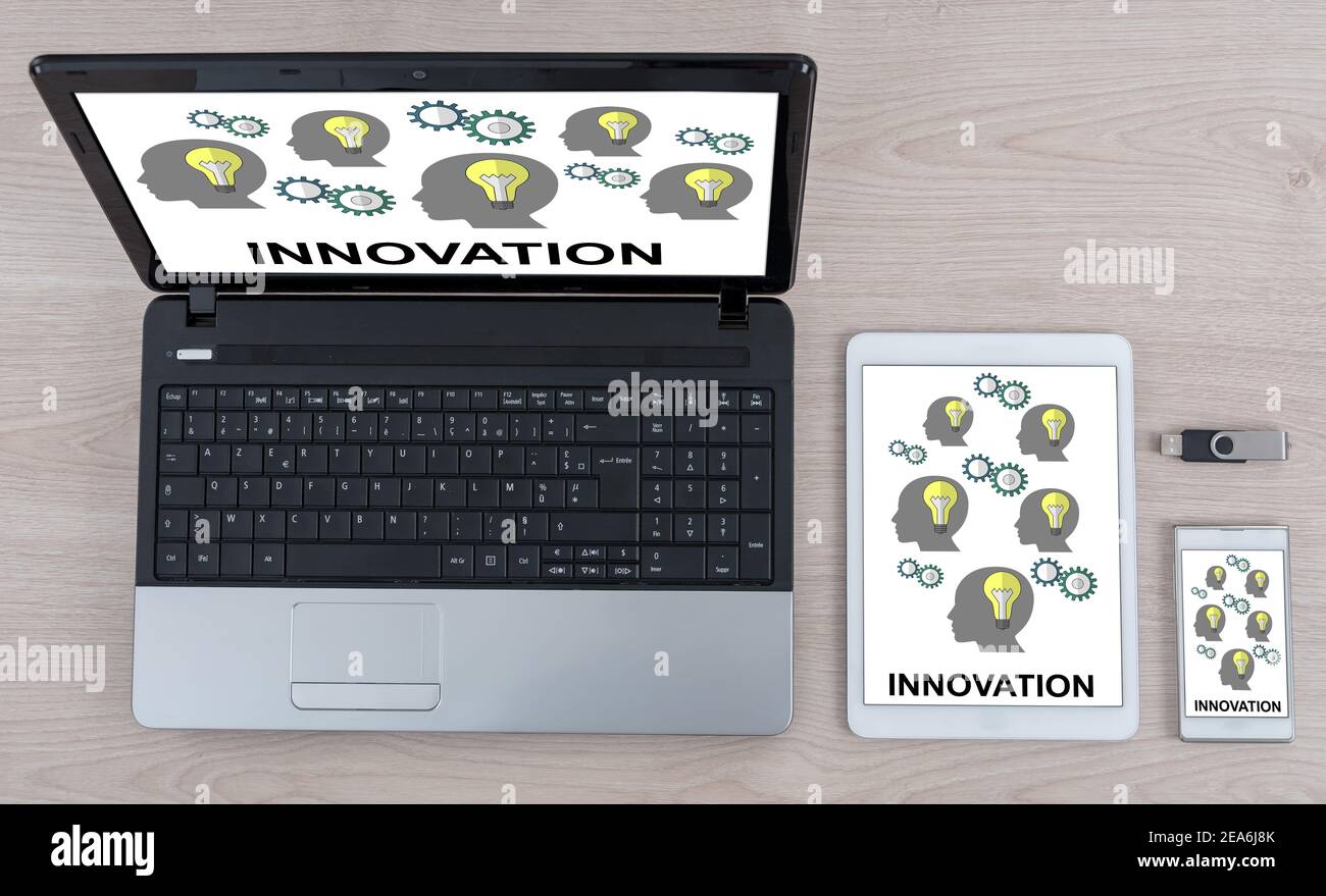 Innovation concept shown on different information technology devices ...