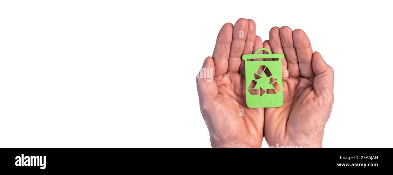 Hands holding a recycling bin isolated on white; Concept of recycling ...