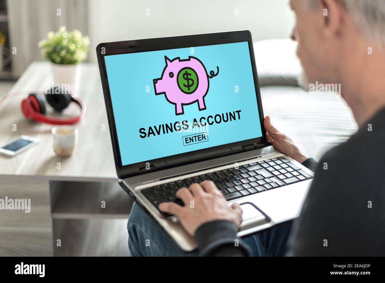 Laptop screen displaying a savings account concept Stock Photo - Alamy