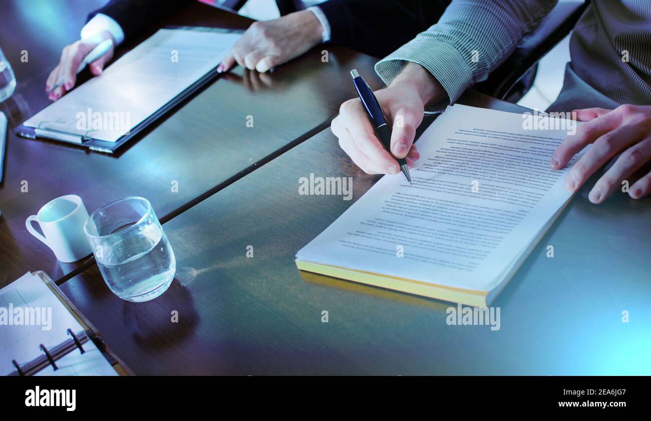 Business people taking notes during a training; light effect Stock ...