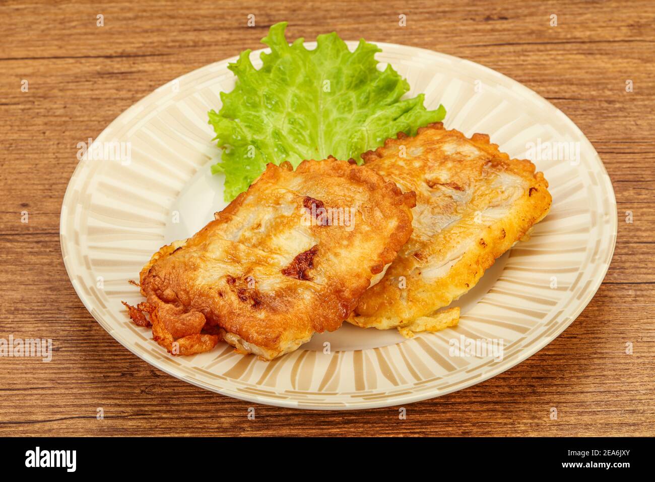 Roasted cod fish in the bread Stock Photo - Alamy