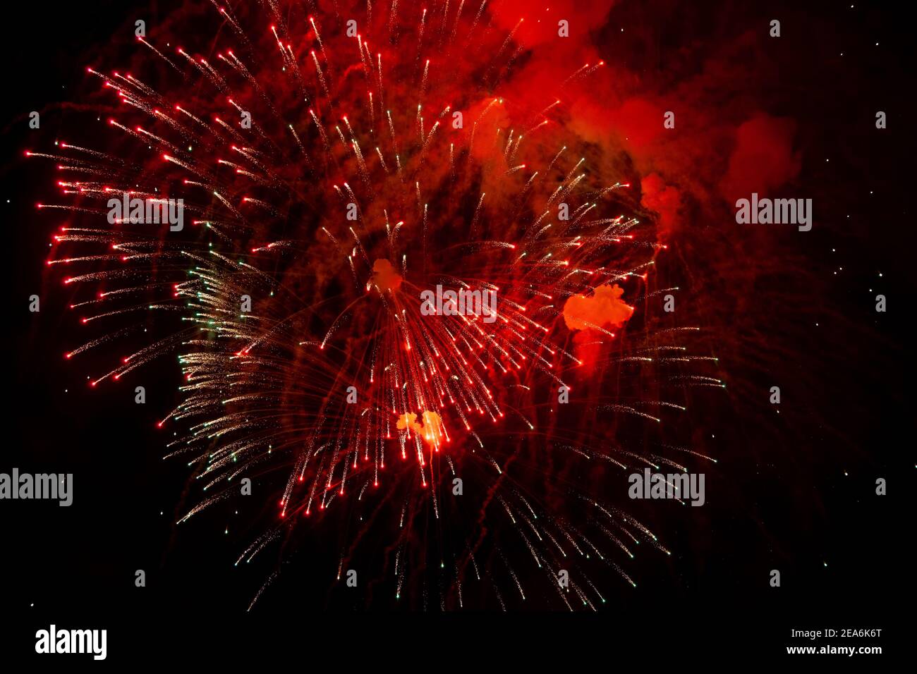 red fireworks in dark night sky Stock Photo - Alamy