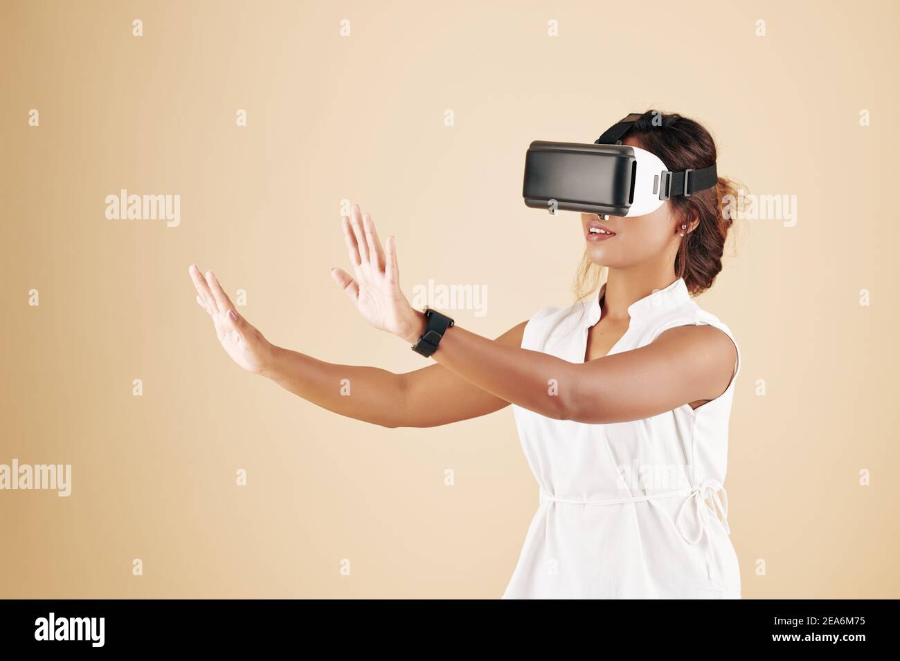 Pretty woman in VR helmet Stock Photo - Alamy