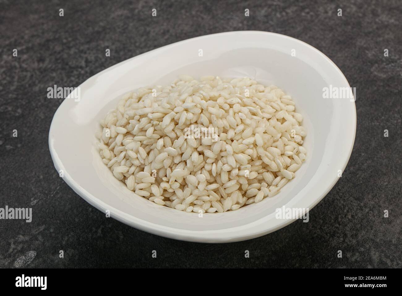Raw Italian arborio rice for Risotto Stock Photo - Alamy