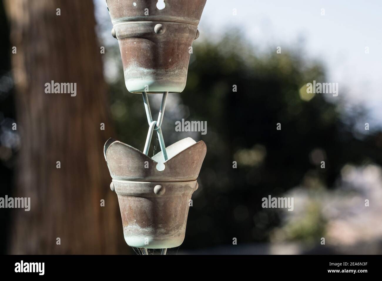Kusari-doi or rain chain at a shrine in Nara, Japan, an alternative to ...