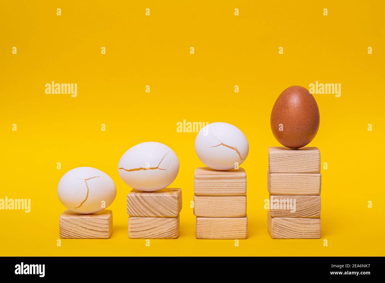 An impromptu career ladder in the form of chicken eggs moving towards ...