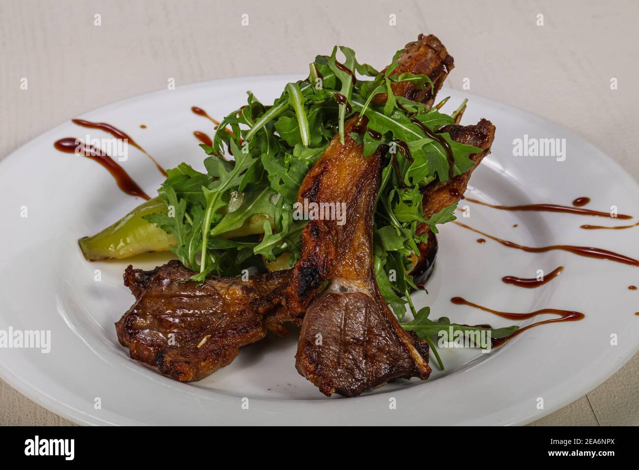 Tasty Grilled rack of lamb barbeque Stock Photo - Alamy