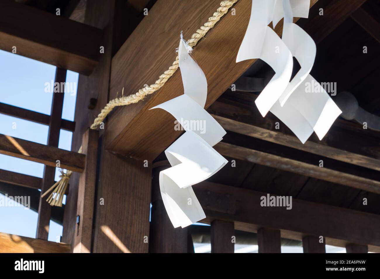 Two white Shide, zigzag-shaped paper streamers, used for purification ...