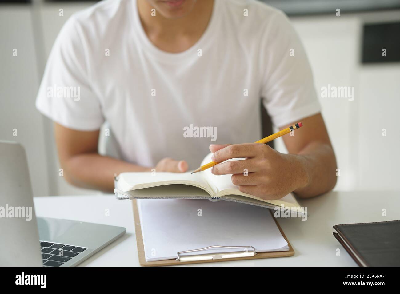 asian young teenage student man teenager entrepreneur working with ...