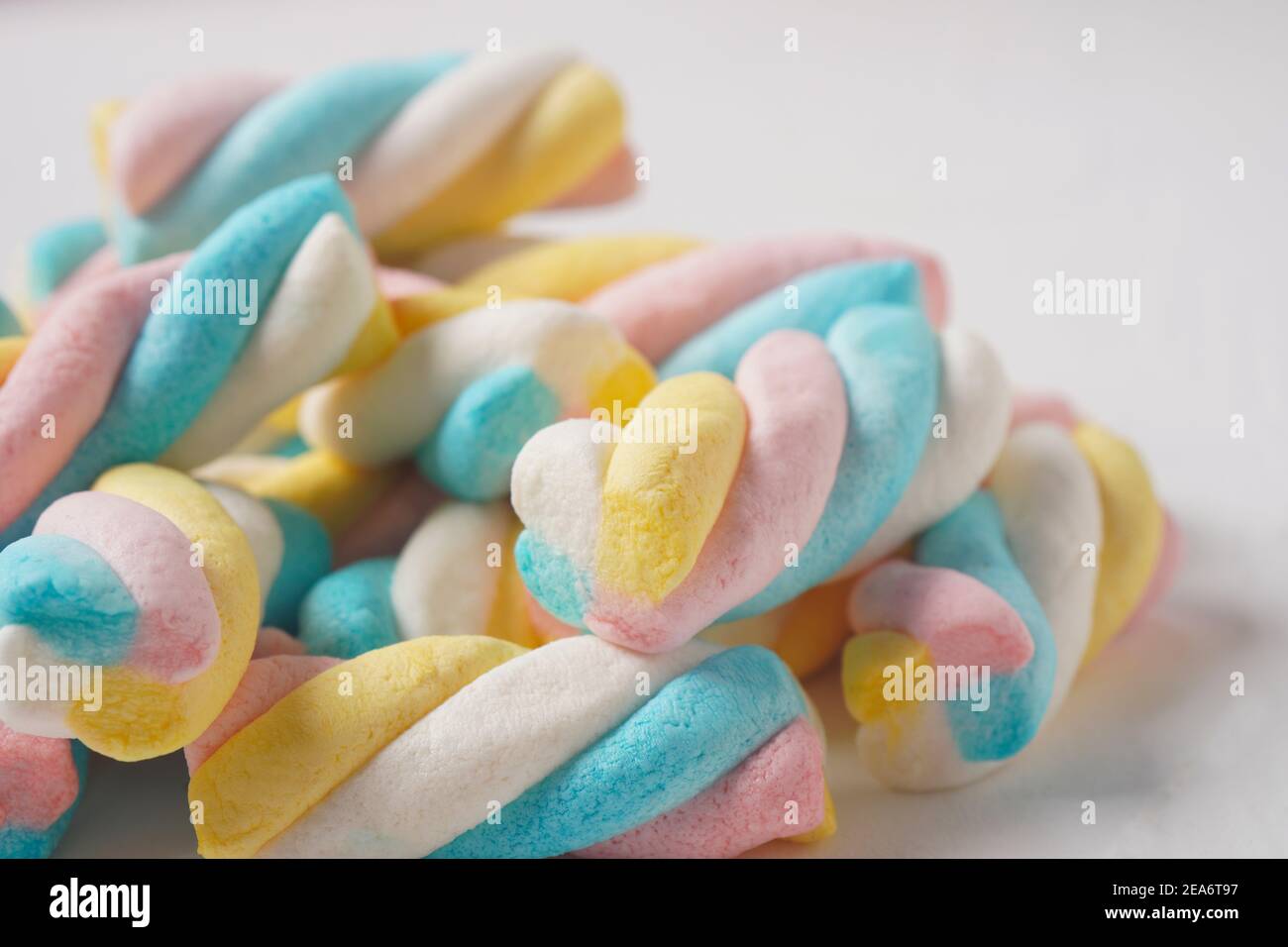 Marshmallow twists. Colored sweet chewy candies Stock Photo - Alamy