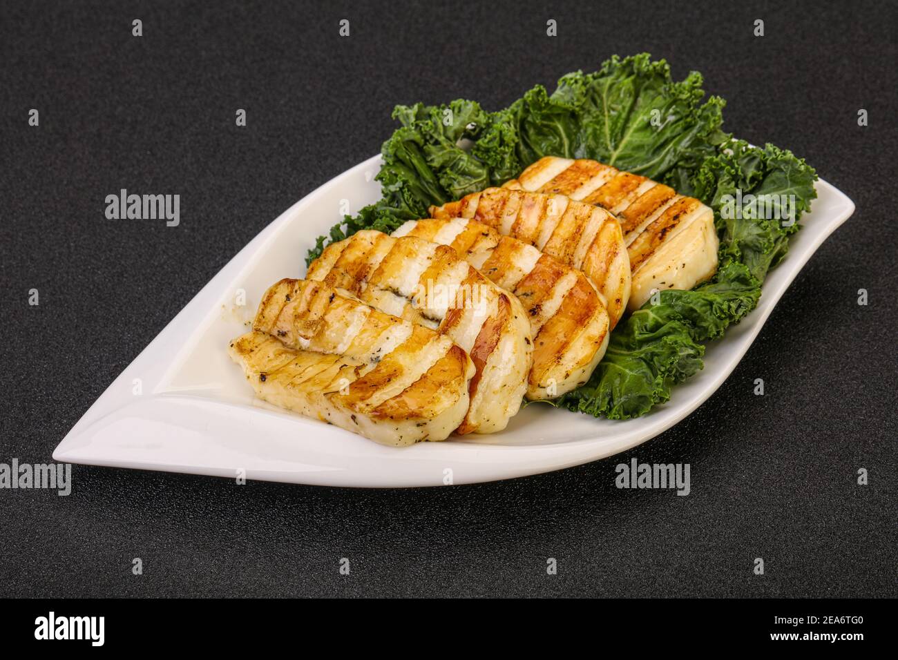 Grilled Greek haloumi cheese with herbs and spices Stock Photo - Alamy