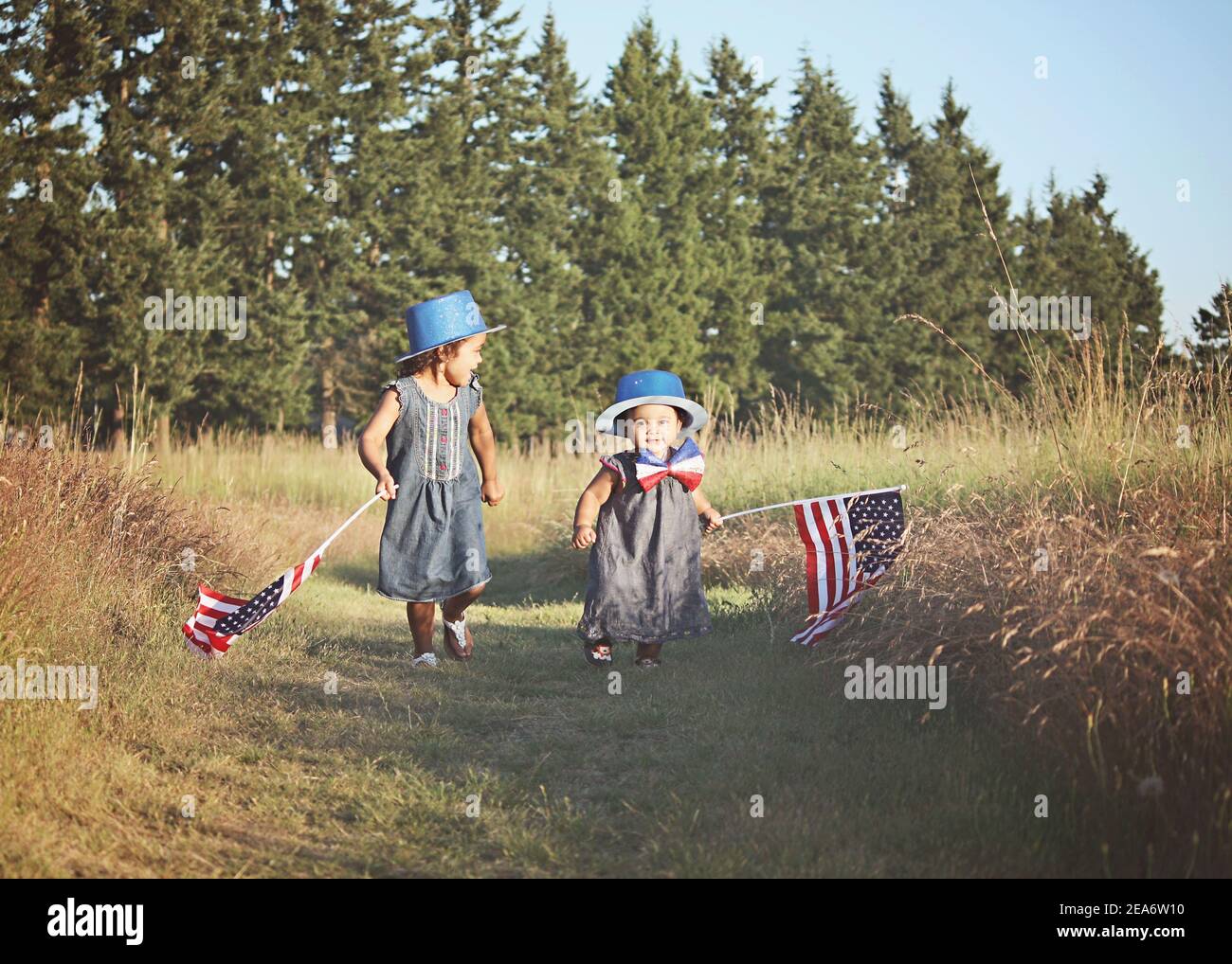 People carrying american flags hi-res stock photography and images - Alamy