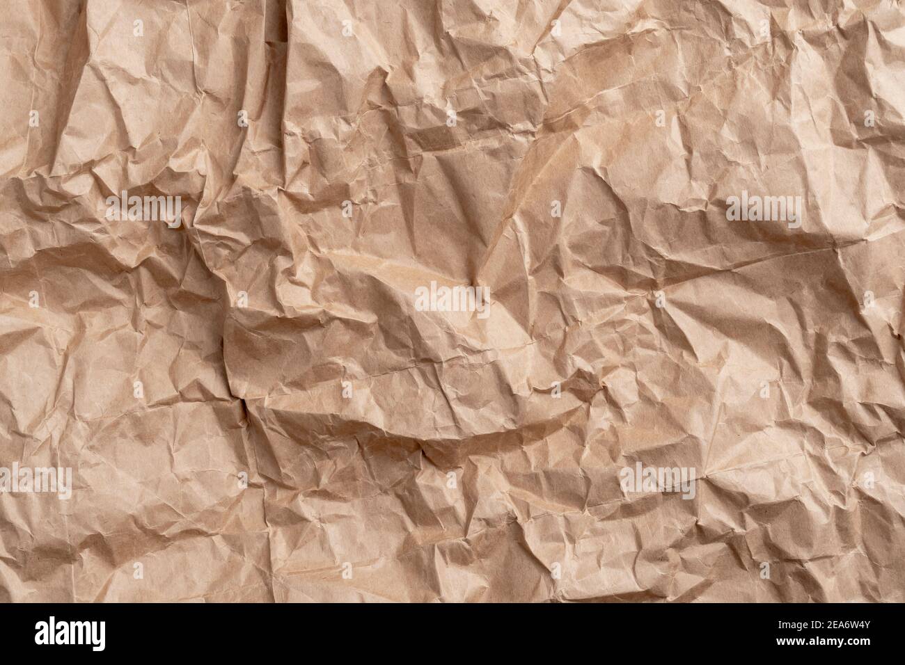 Textured surface of recycled packaging wrapping crumpled paper. Copy ...