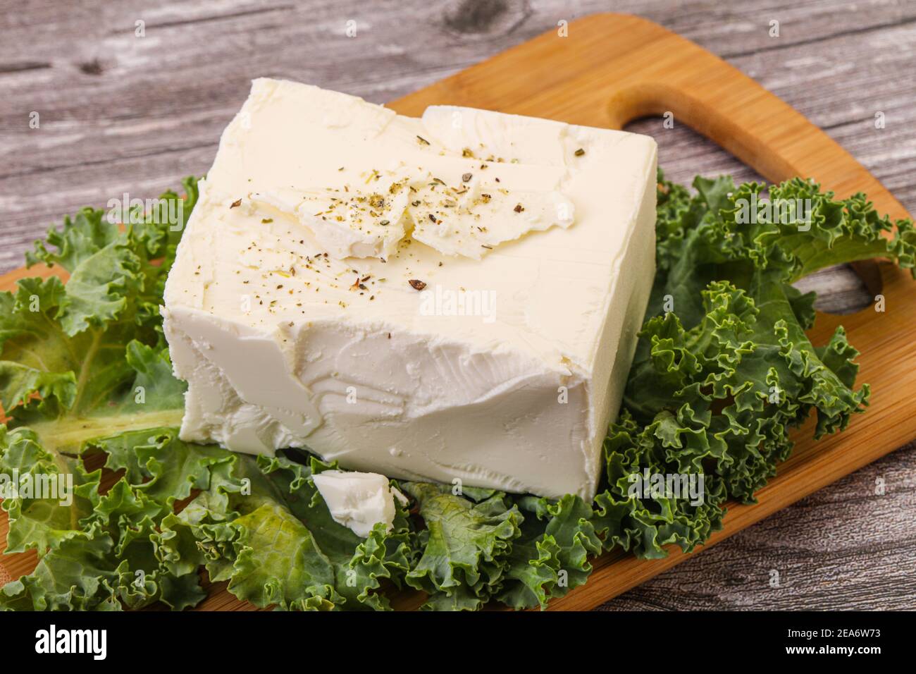 Traditional tasty Greek Feta soft cheese brick Stock Photo - Alamy