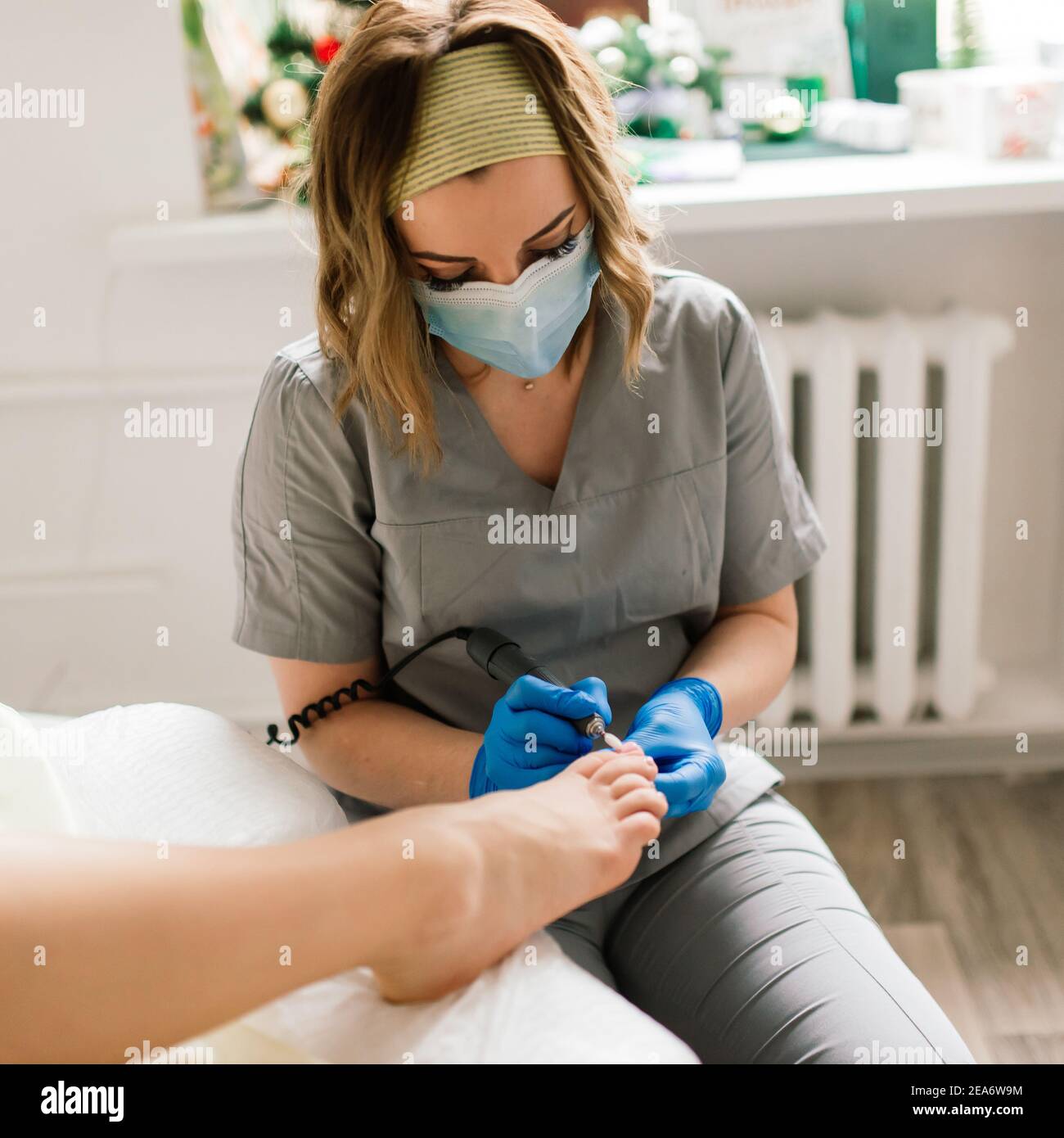 Master during a pedicure. The process of professional pedicures ...