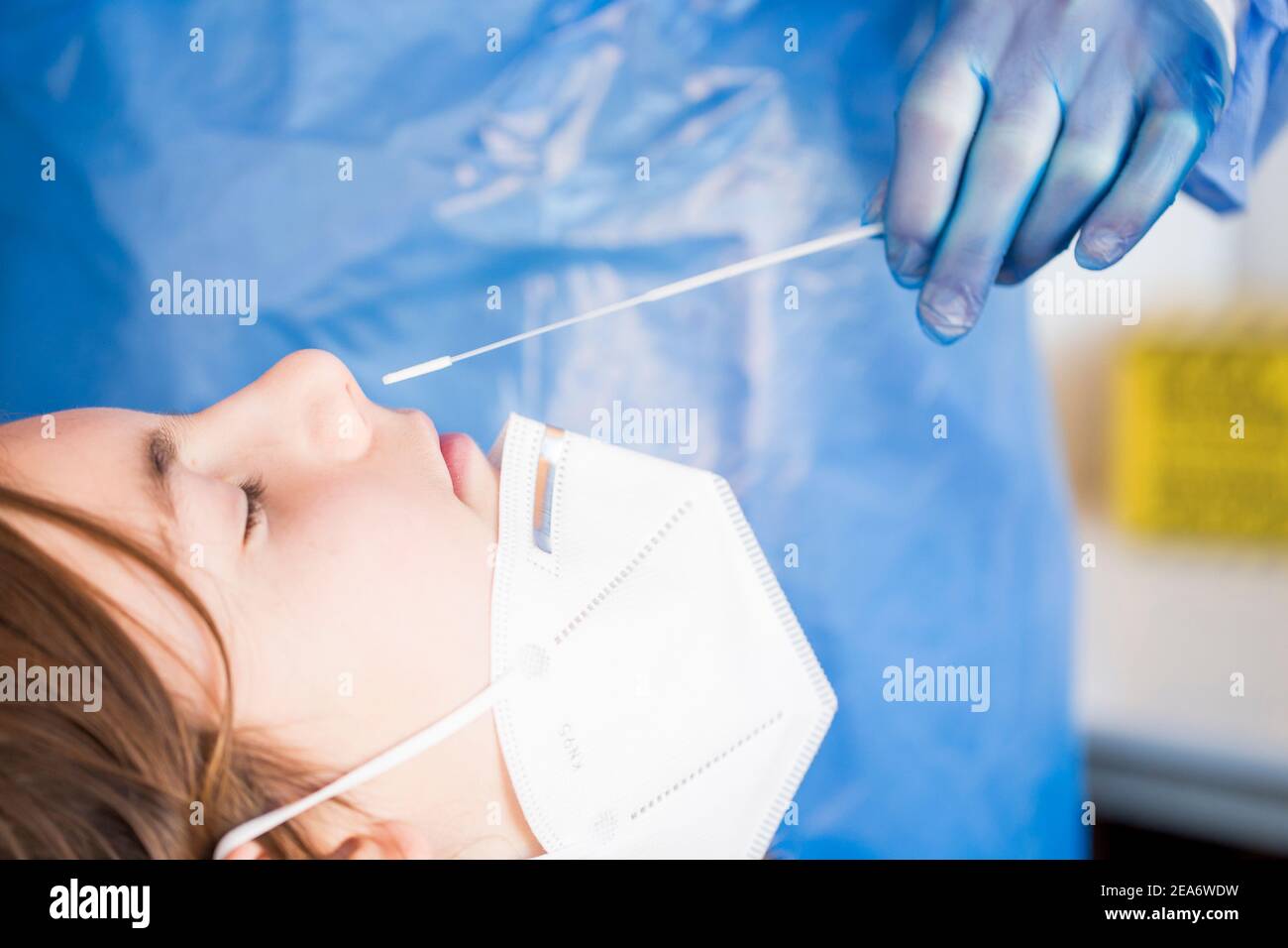 Close-up of a doctor performing a PCR test on a young boy Stock Photo ...