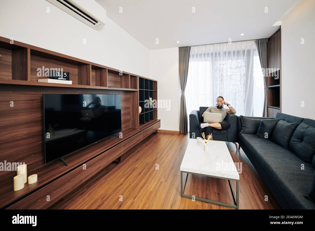 Software developer working from home Stock Photo - Alamy