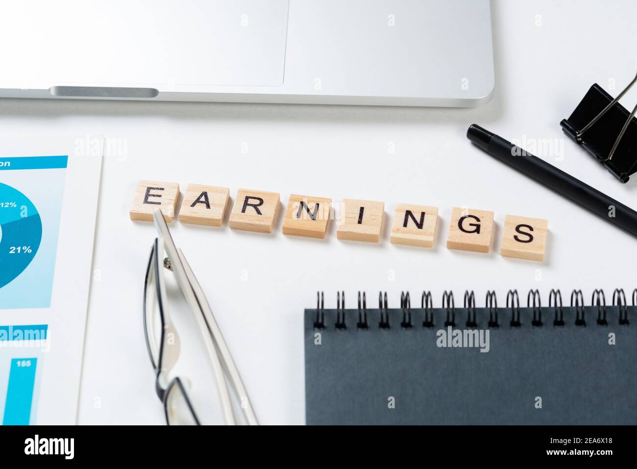 Earnings management concept with letters Stock Photo - Alamy