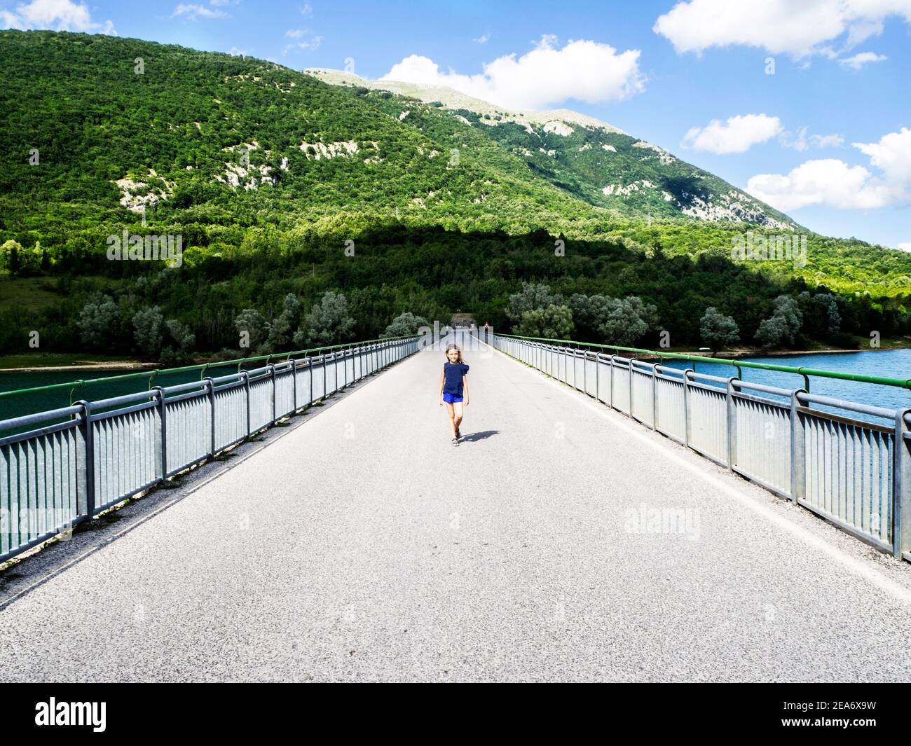 Girl crossing bridge hi-res stock photography and images - Alamy