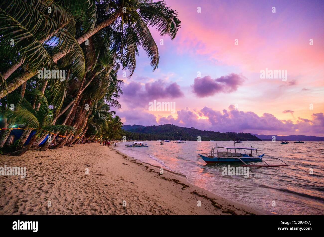 Port Barton Beach at sunset on paradise island, tropical travel ...
