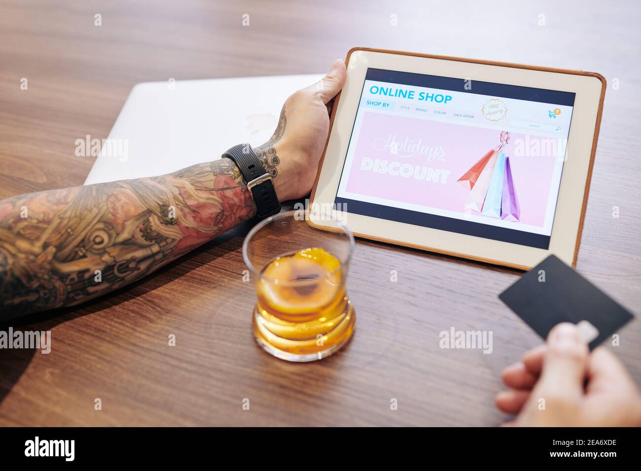 Man shopping online Stock Photo - Alamy