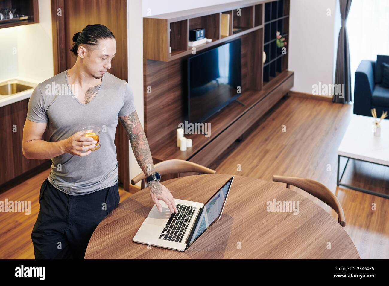 Man uploading chart online Stock Photo - Alamy