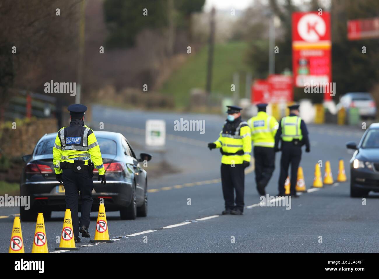 Garda stop vehicles at a checkpoint on the Irish border between Emyvale ...