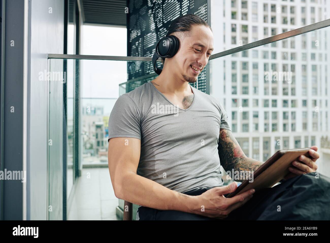 Man watching comedy movie Stock Photo - Alamy