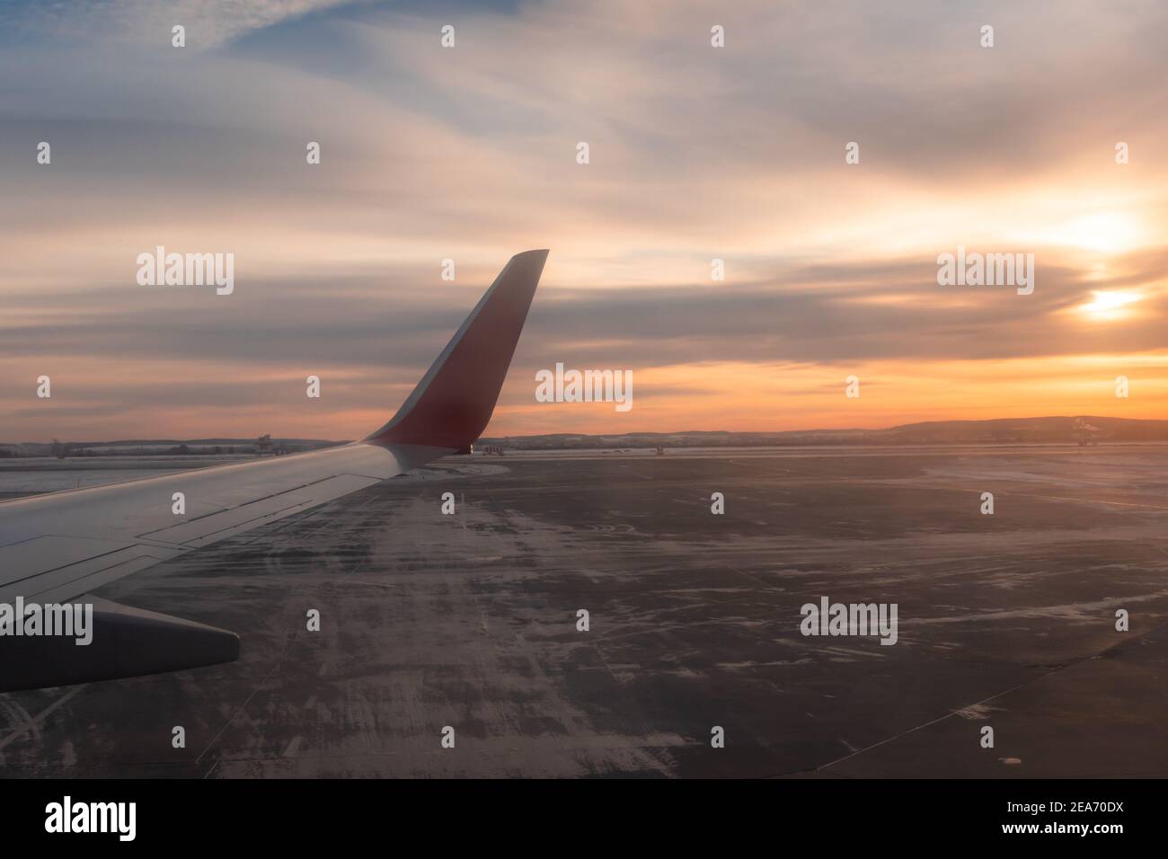 view from the window of an airplane taking off on the runway and the ...