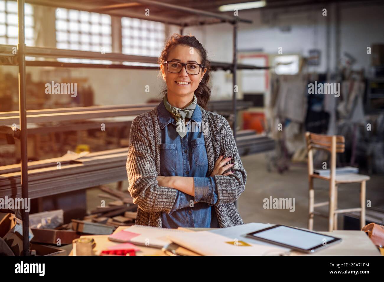 Strong confident middle aged woman engineer standing and looking at the ...