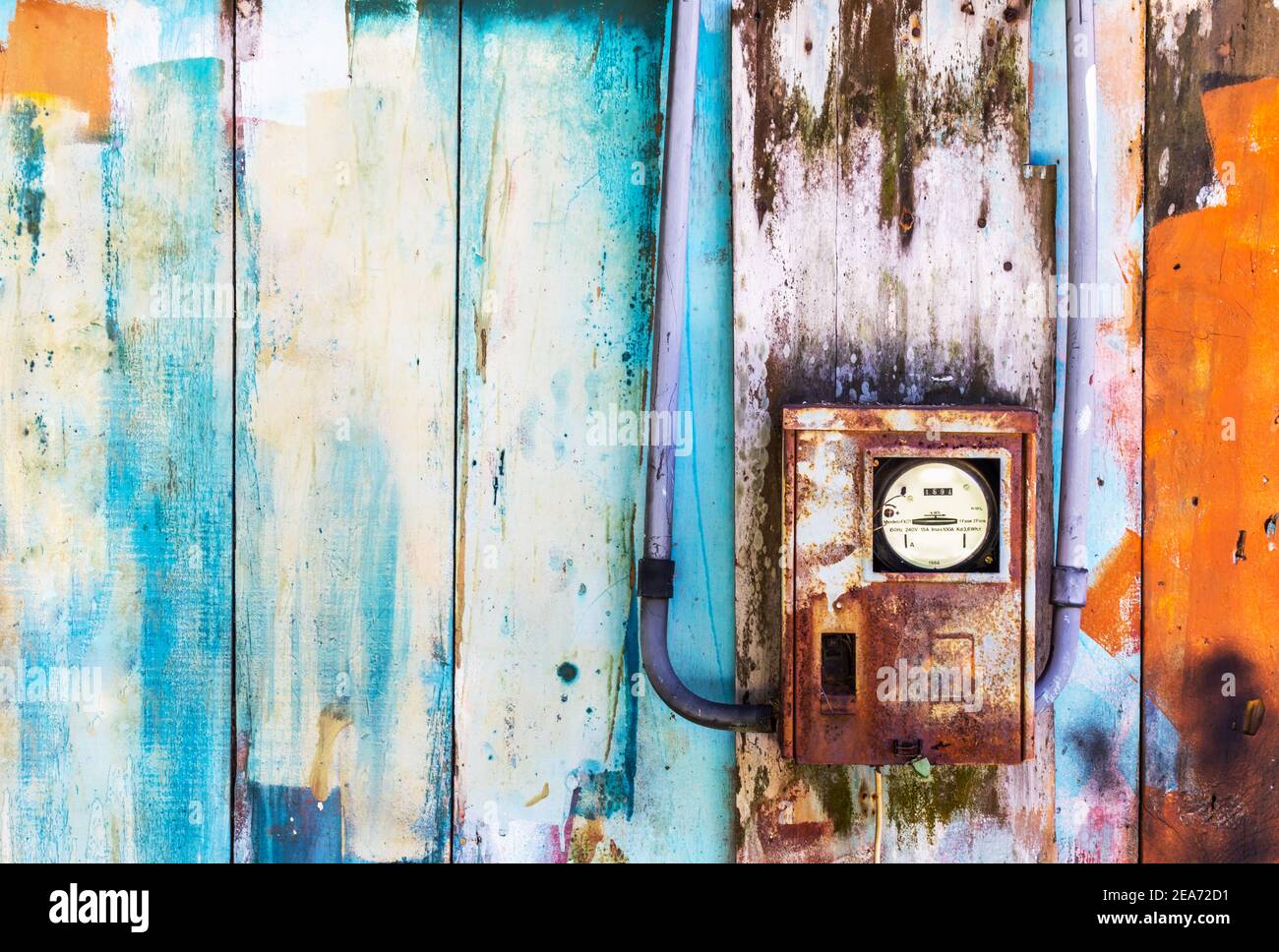 Old electricity meter on a weathered wooden wall Stock Photo - Alamy