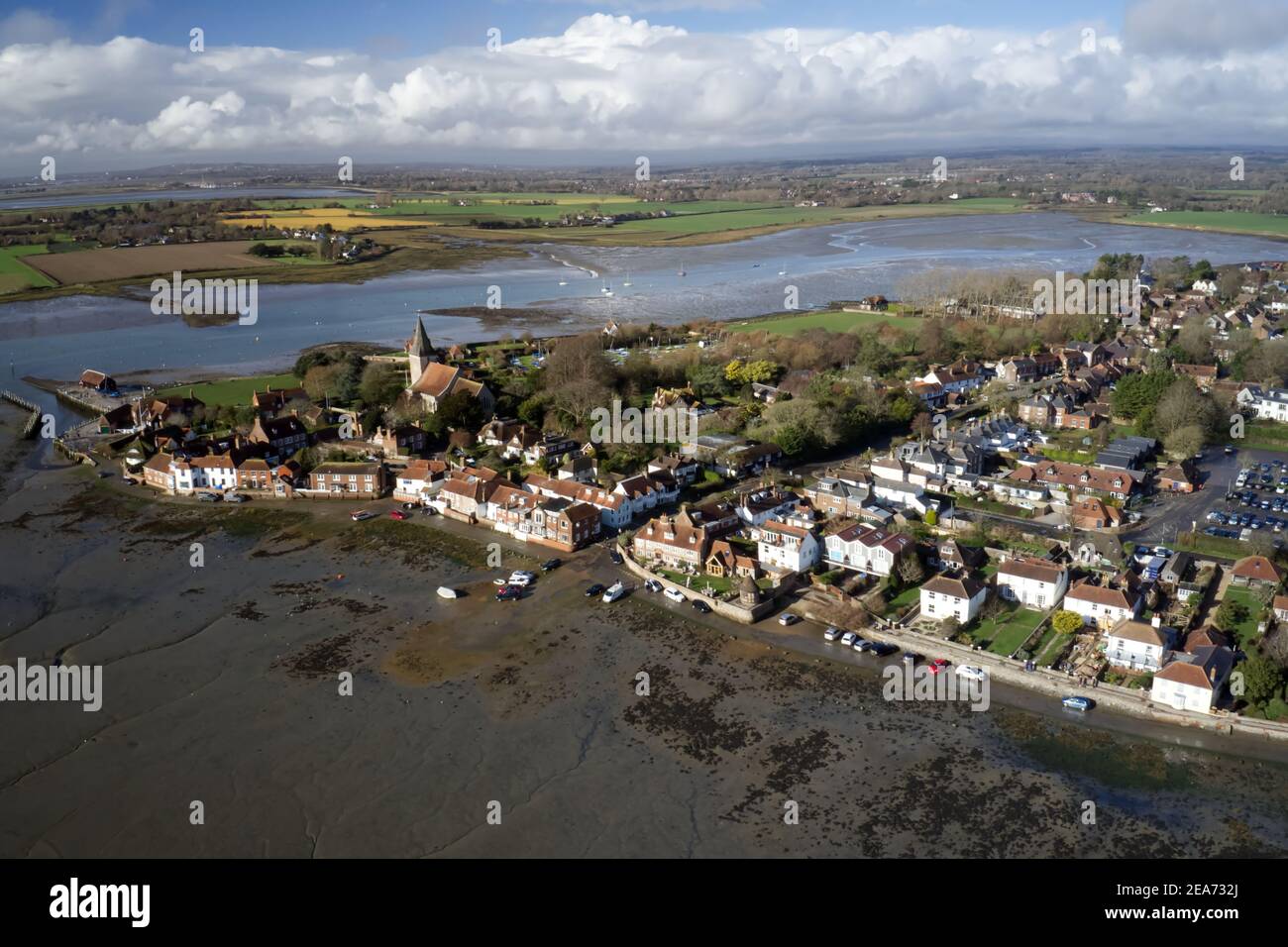 Bosham Village and estuary aerial view with dramatic cumulus cloud on ...