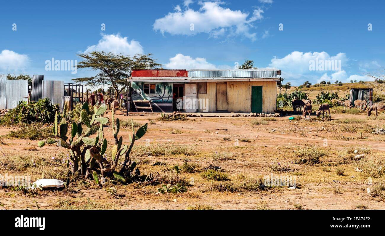 Village of Kenya in a cloudy day with poor houses Stock Photo - Alamy