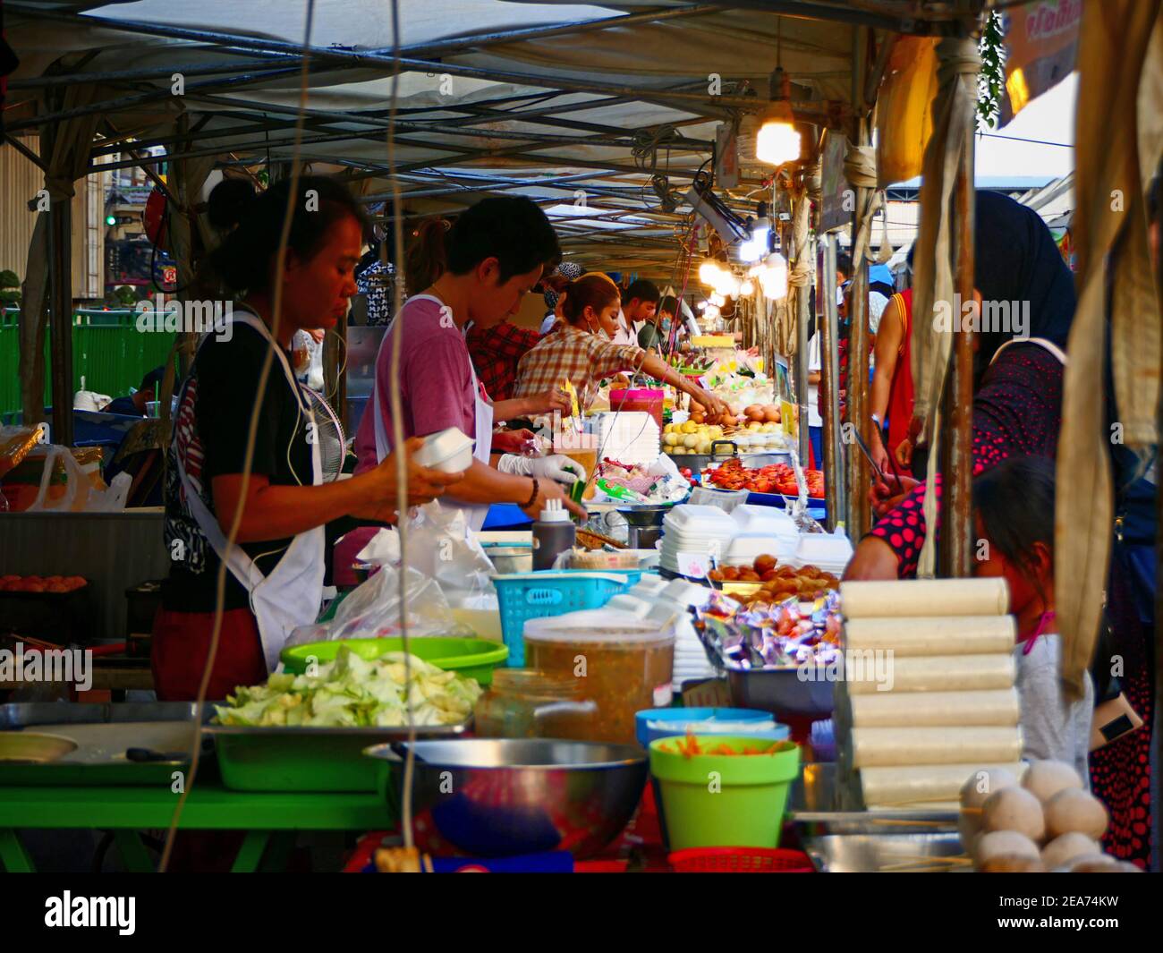 Open air night market, street food foods stall vendor Bangkok Thailand ...