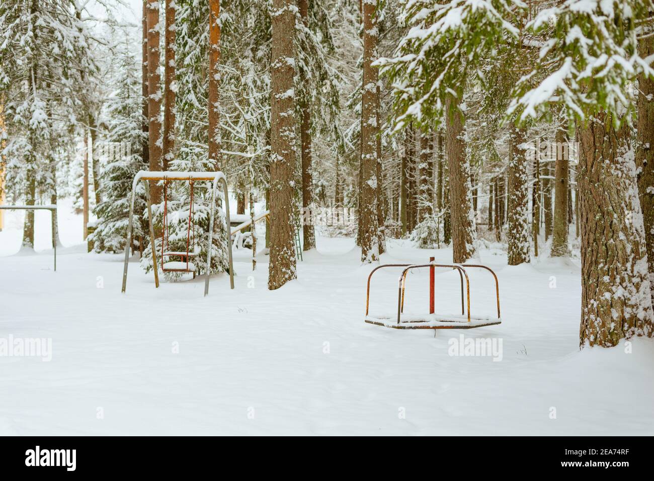Winter scenery of a playground covered with snow Stock Photo - Alamy