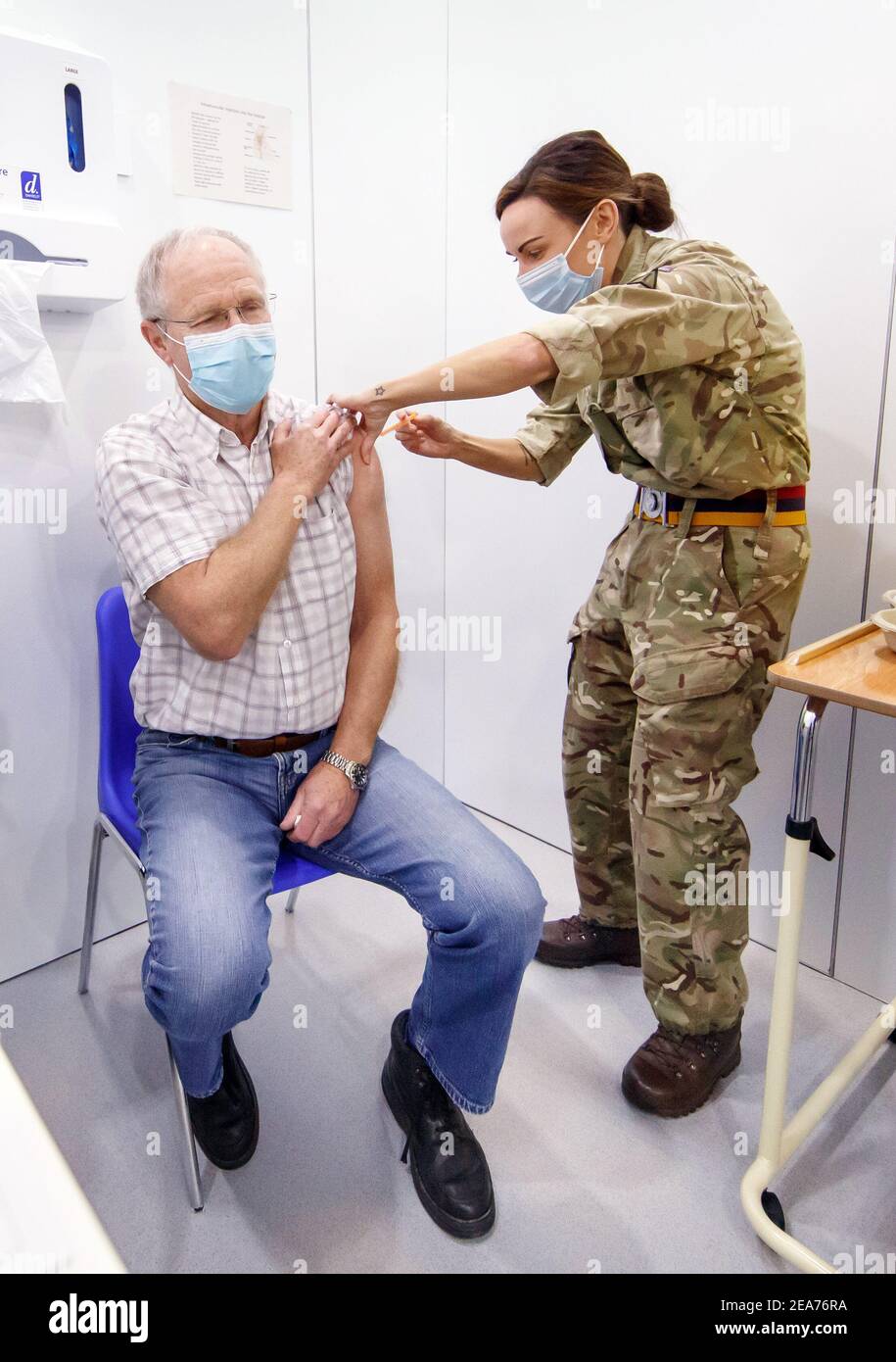 Richard Moss, 73, receives an injection of the the Oxford/AstraZeneca ...