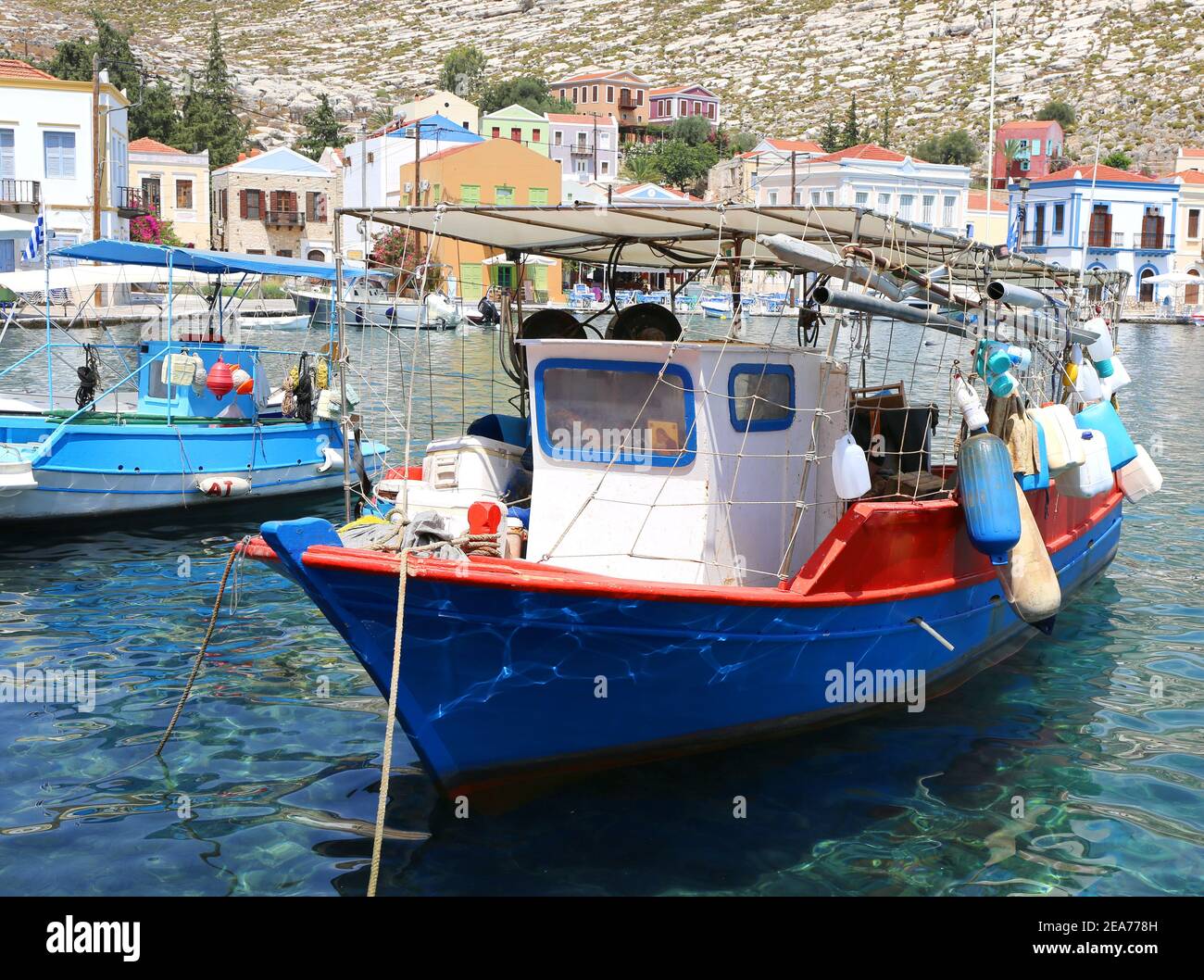Greek Fishing Boats tied at the Port in Kastellorizo,Greece Stock Photo ...