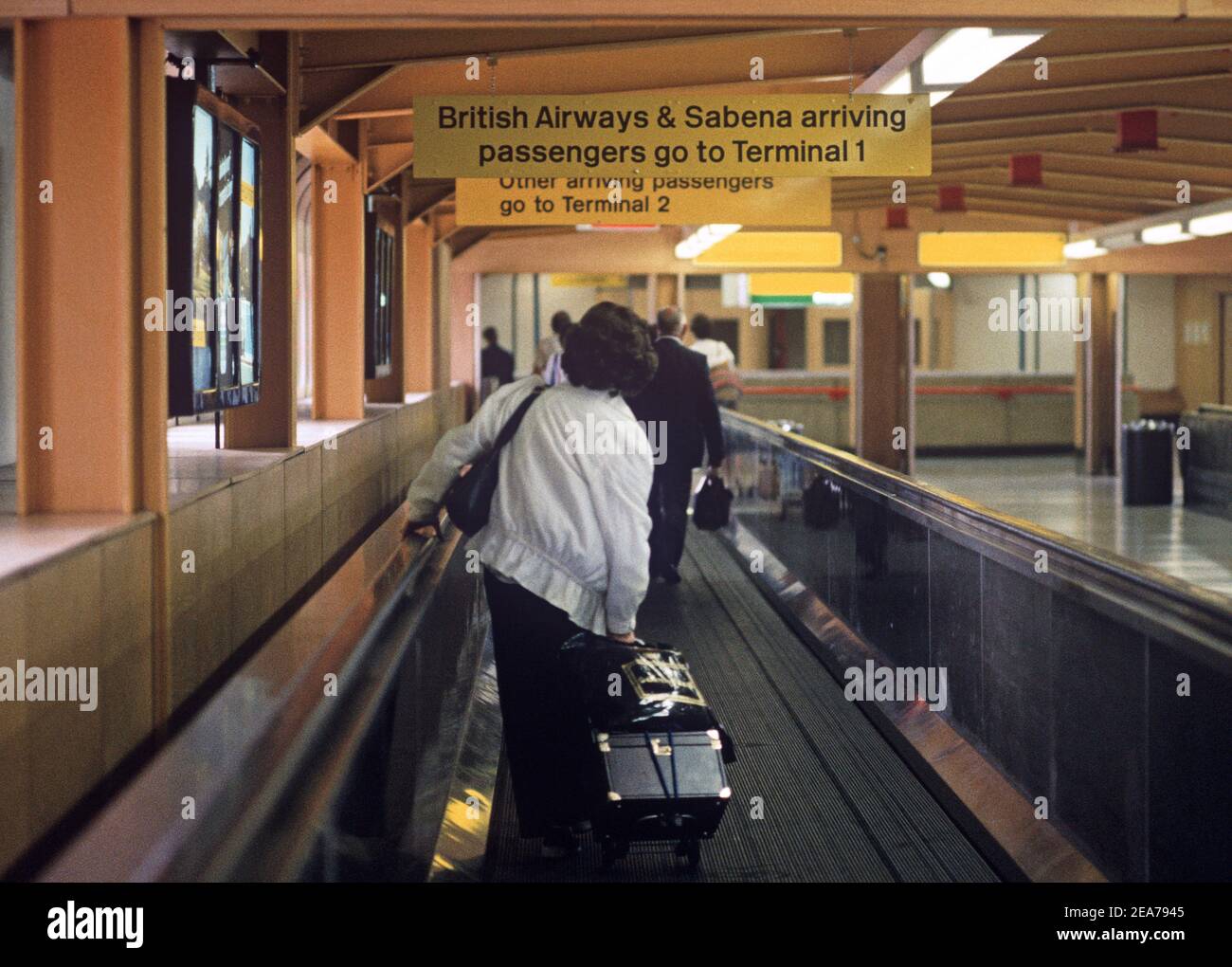 Passenger walkway, Heathrow Airport, 1980s Stock Photo - Alamy