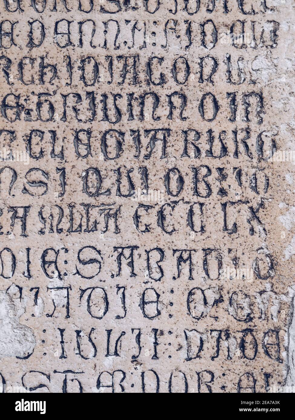 Vertical shot of ancient writings on the walls captured Burgos ...